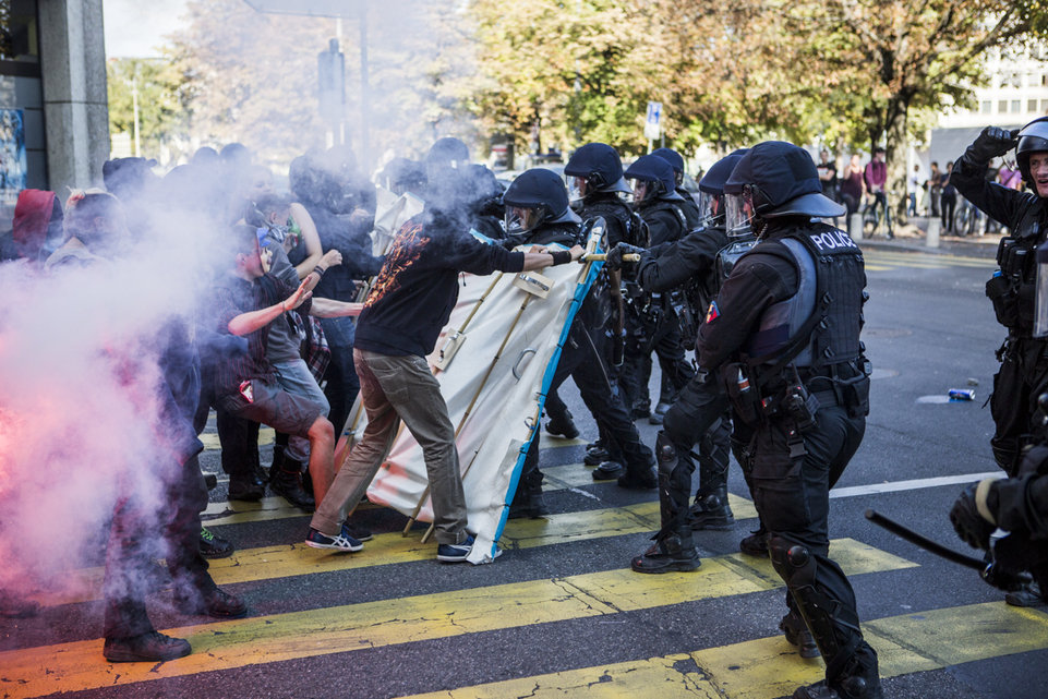 Scenes Seldom Seen: Geneva Police, Protesters Face Off During ...